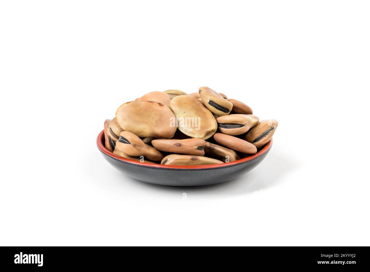 Fava beans in a red and black bowl isolated over white background Stock ...