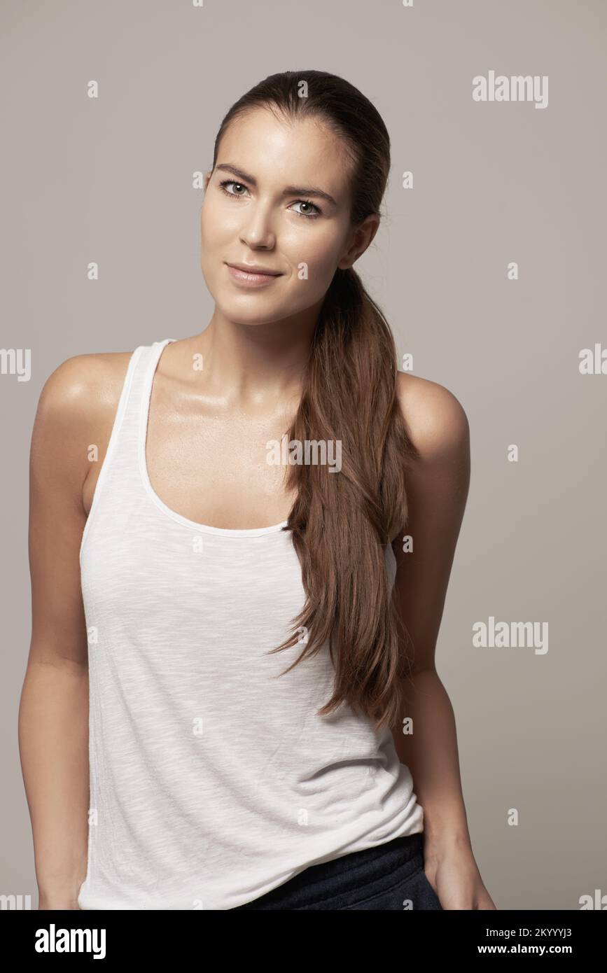 Still stylish in her workout clothes. Studio portrait of a fit young ...