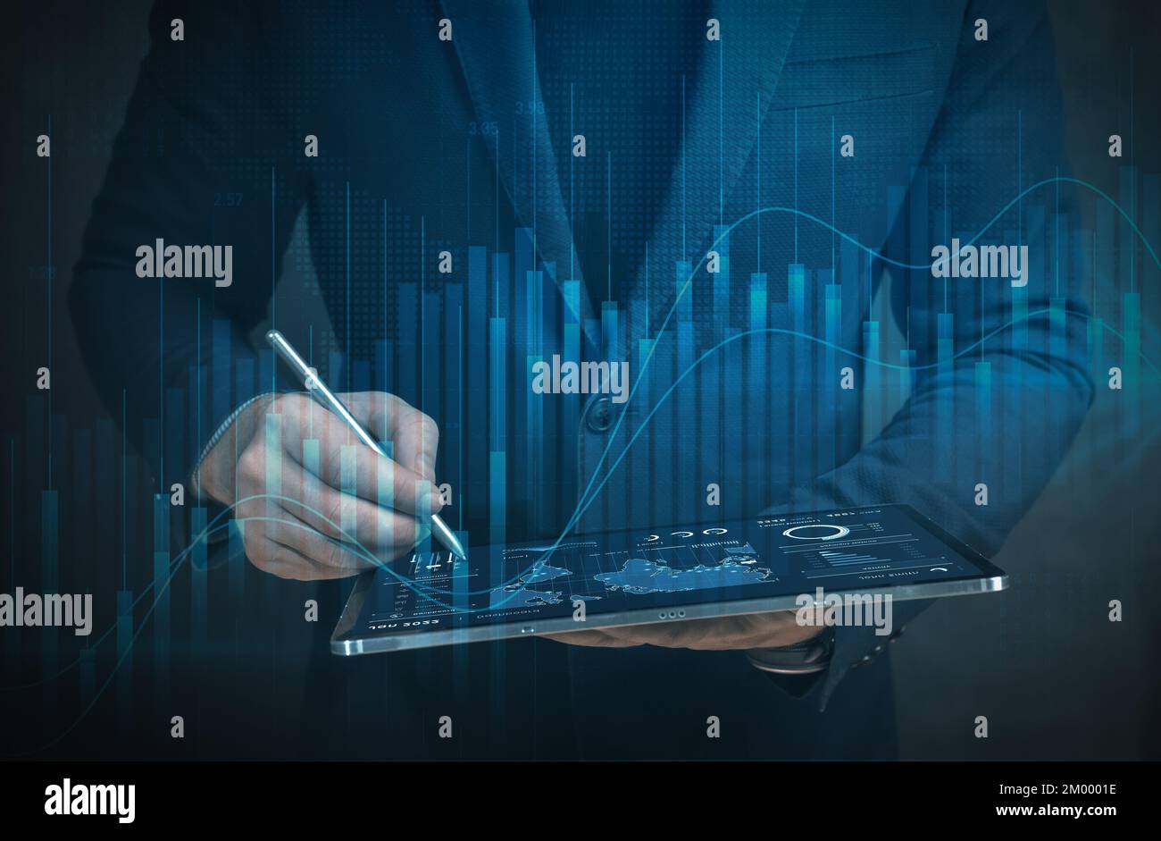 Businessman holding tablet and showing growing virtual hologram of statistics, graph and chart ...