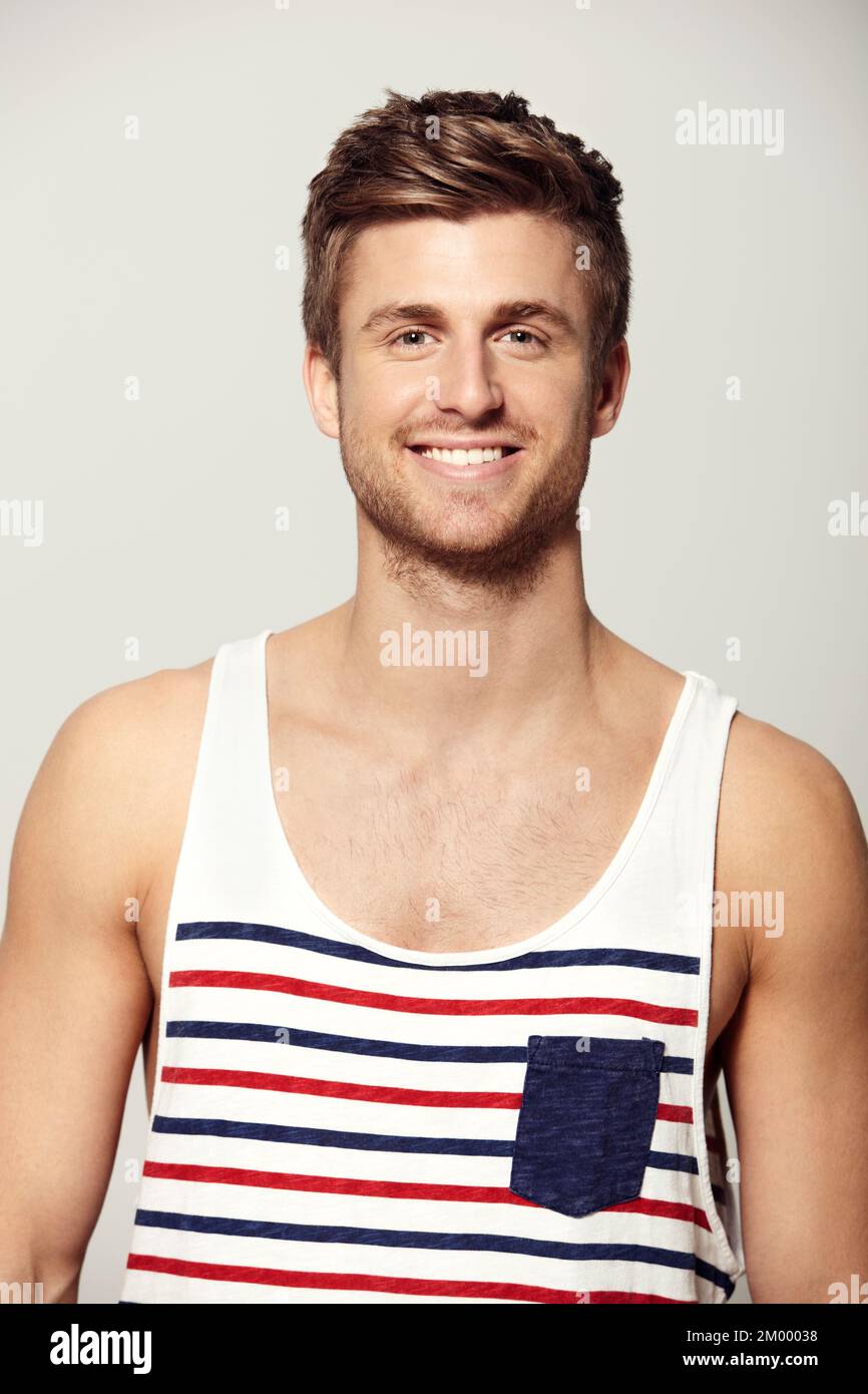 Simple style is the best kind...Studio portrait of a handsome young man ...