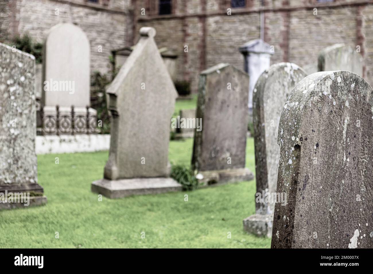 Gravestones and memorials at cemetery in Scotland Stock Photo - Alamy
