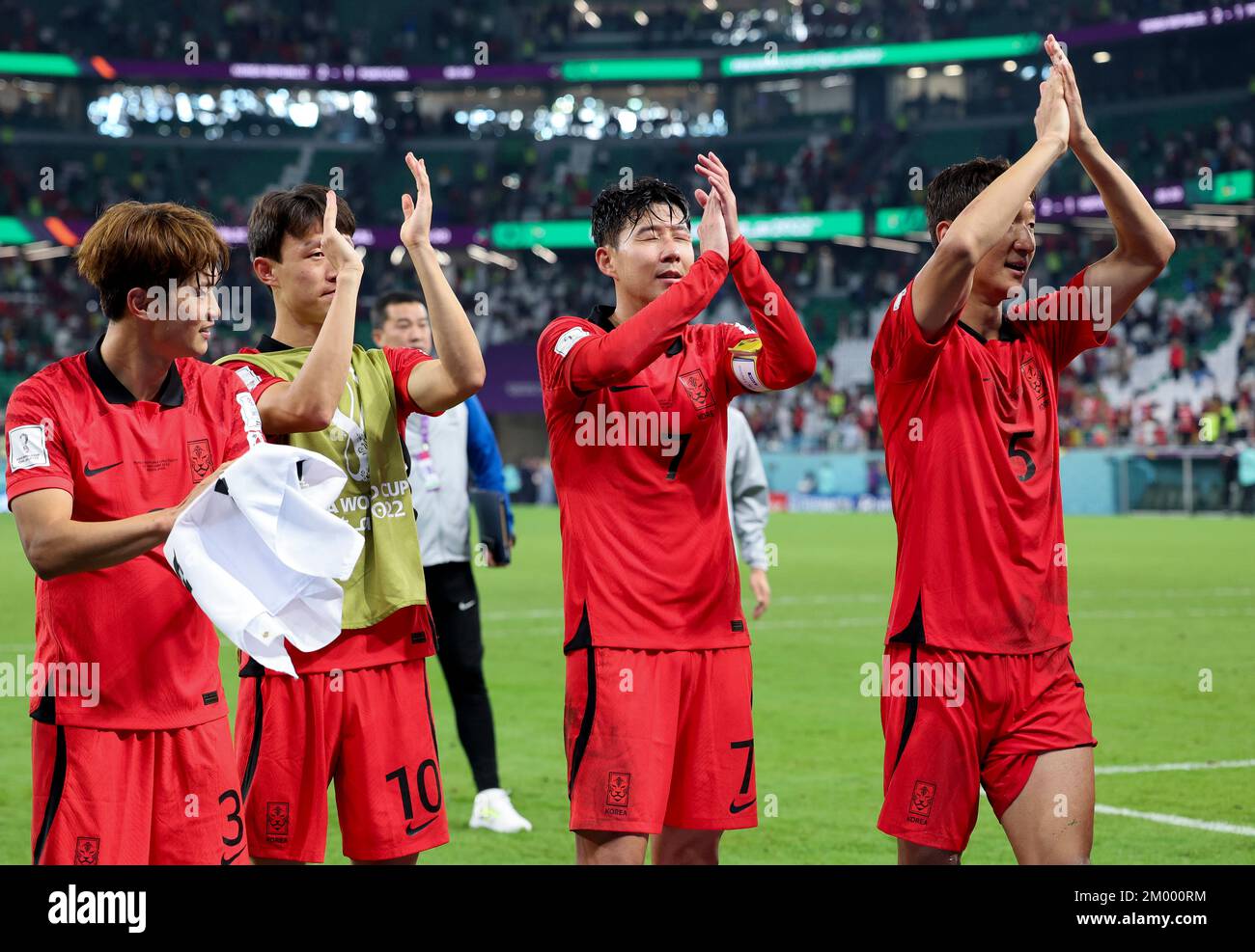 Doha, Qatar. 02nd Dec, 2022. Son Heung-Min, Jung Woo-Young of South ...