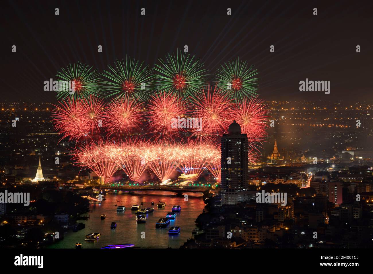 Beautiful fireworks and iconic Bangkok landmarks are illuminated by ...