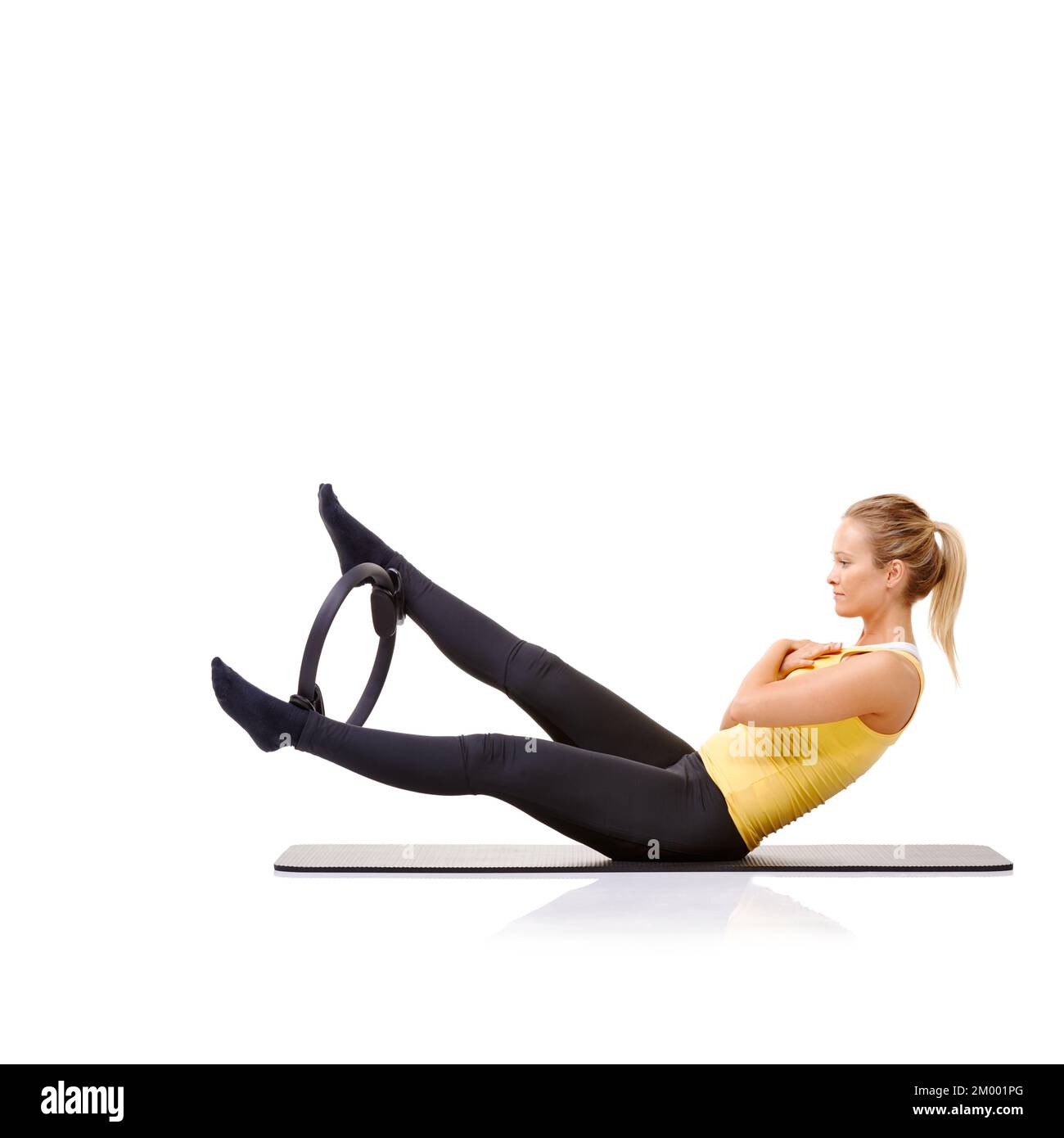 Balance and stamina - Pilates Ring Exercises. A pretty young blonde ...