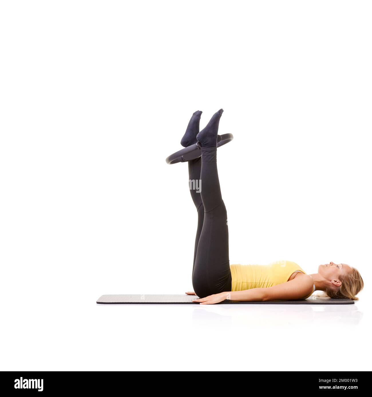 Engaging her leg muscles. A pretty young blonde working her legs out ...