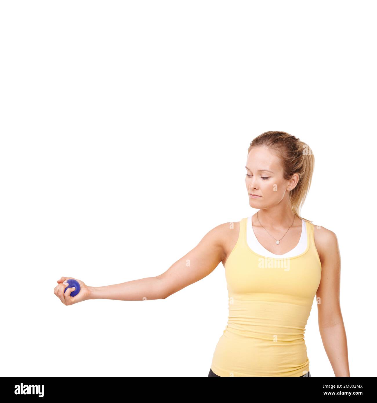 Making good use of her stress ball. Cropped view of a woman squeezing a ...