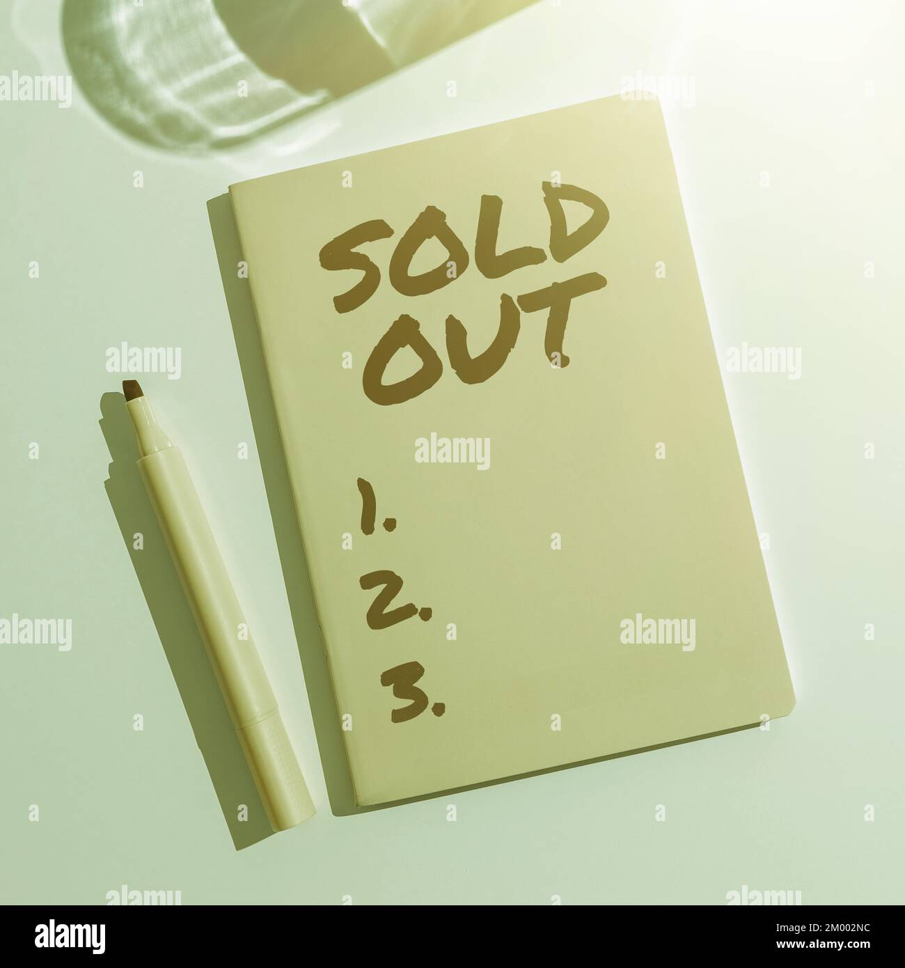 Hand writing sign Sold Out. Word Written on Not available anymore ...