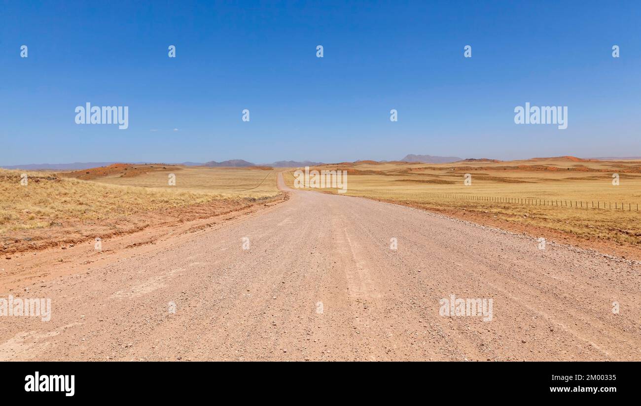 Gravel road C14, in the background the Tiras Mountains, Namibia, Africa ...