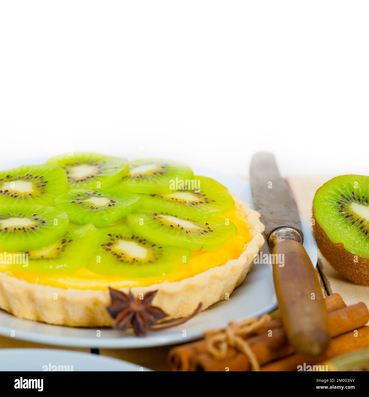 Kiwi pie tart with lemon custard cream and spices Stock Photo - Alamy