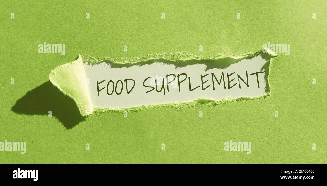 Sign displaying Food Supplement. Word Written on Conditions and ...