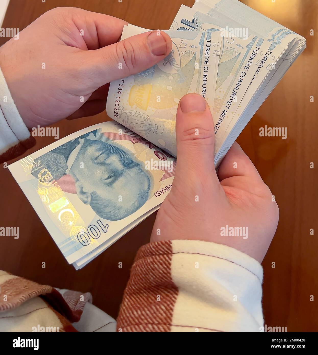 Top View Hand of man counting Turkish money. Turkish lira banknote ...