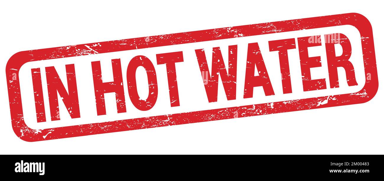 IN HOT WATER text written on red rectangle stamp sign Stock Photo - Alamy