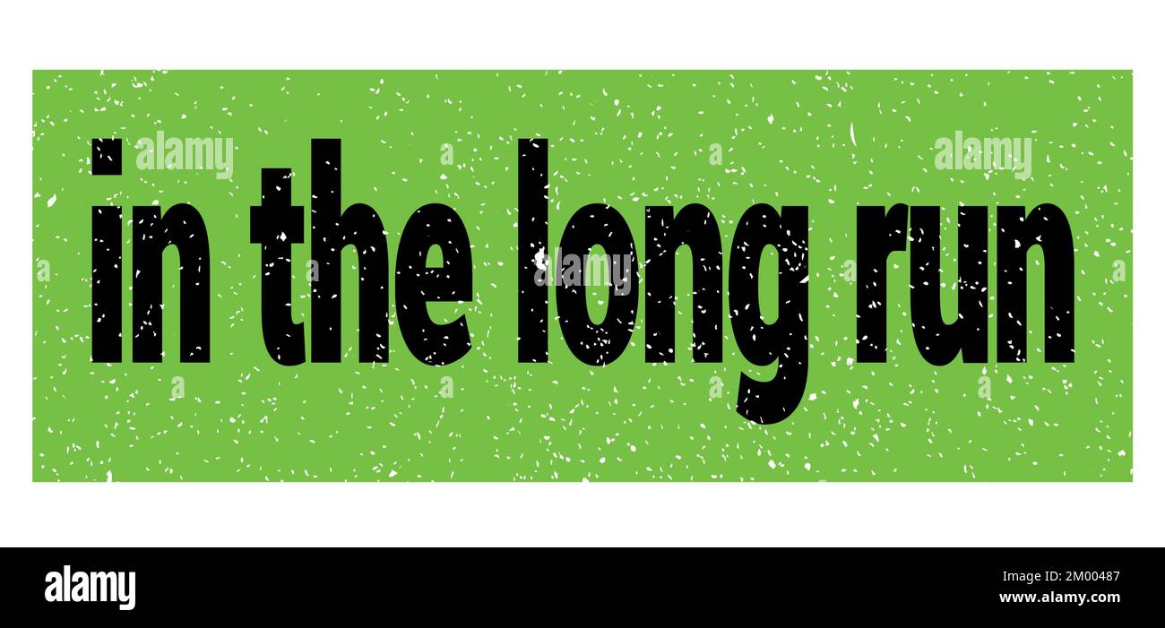 in the long run text written on green-black grungy stamp sign Stock ...