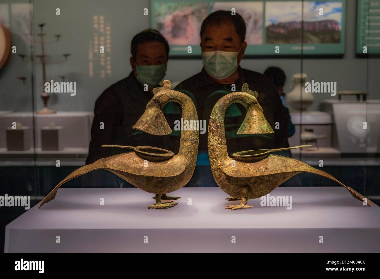 NANNING, CHINA - DECEMBER 1, 2022 - People view feathered bronze ...