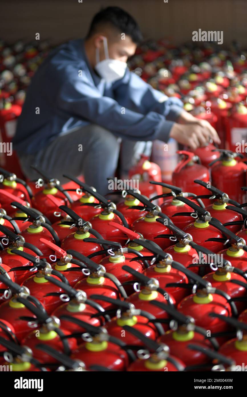 BAZHOU, CHINA - DECEMBER 3, 2022 - A staff member inspects fire ...