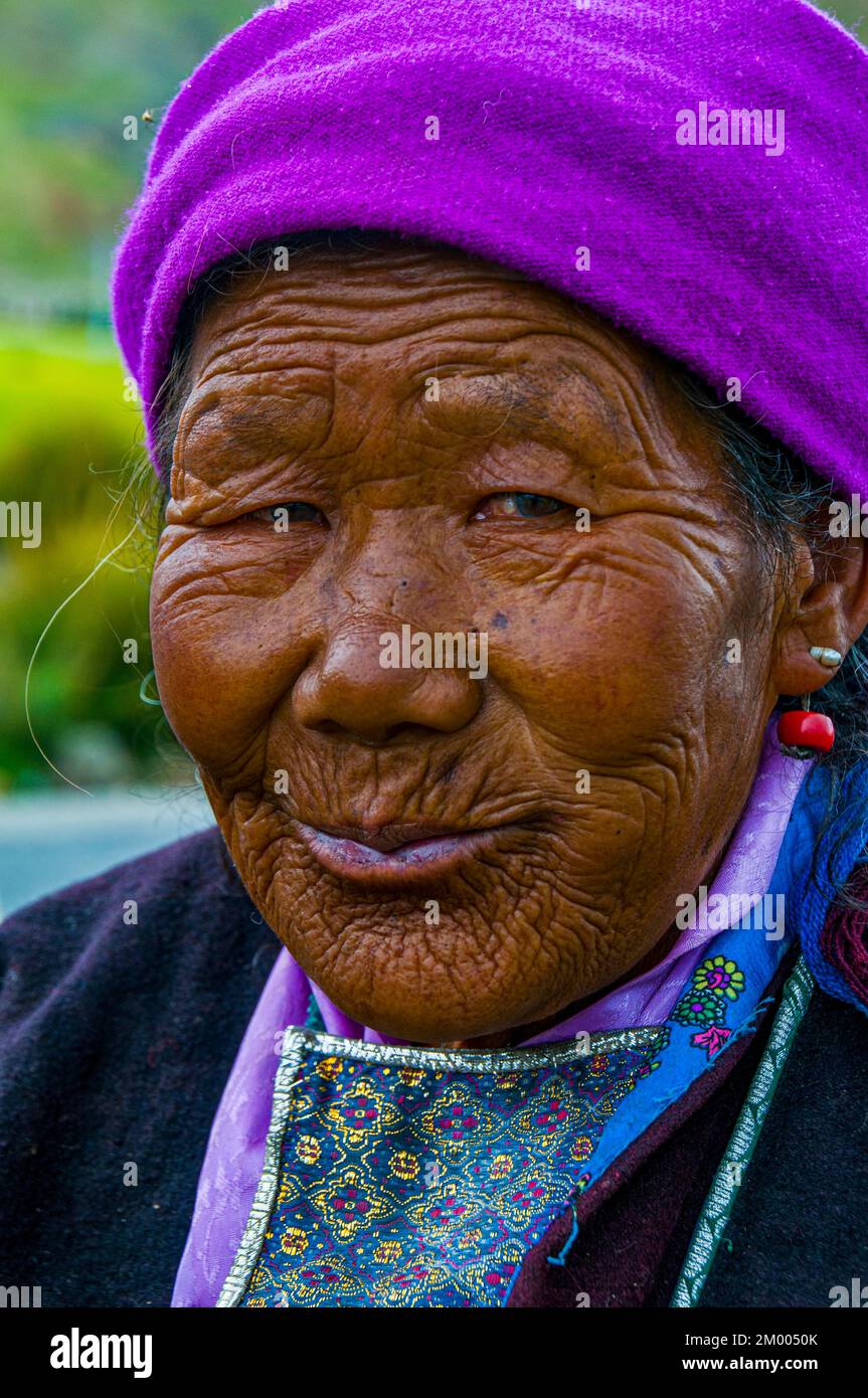 Friendly old woman along the friendship highway, Tibet, Asia Stock ...