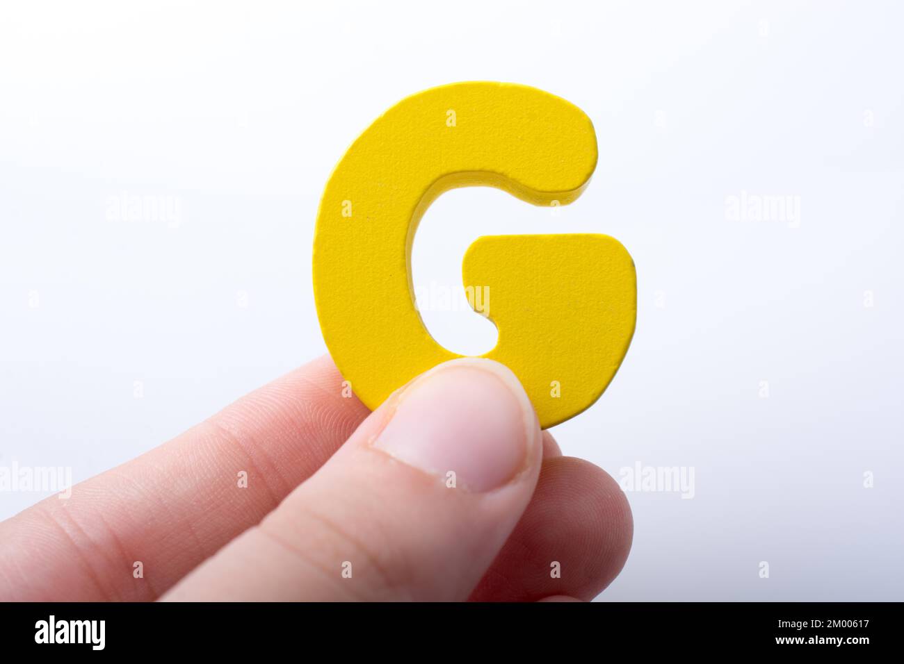 Letter cube of G of Alphabet made of wood Stock Photo - Alamy