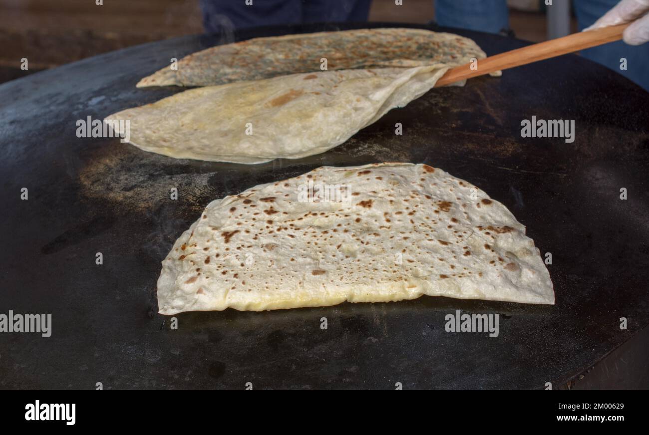 Home making of traditional turkish gozleme pancake Stock Photo - Alamy