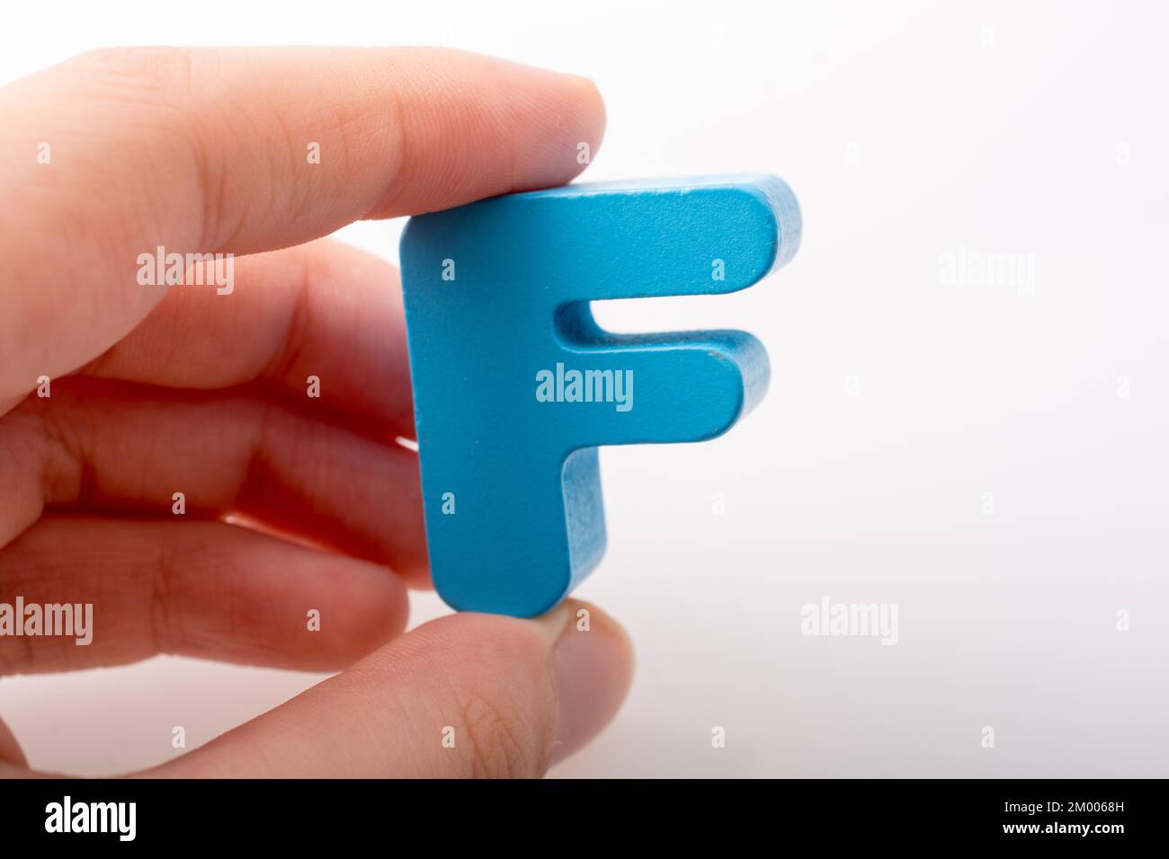 Letter cube of Fof Alphabet made of wood Stock Photo - Alamy