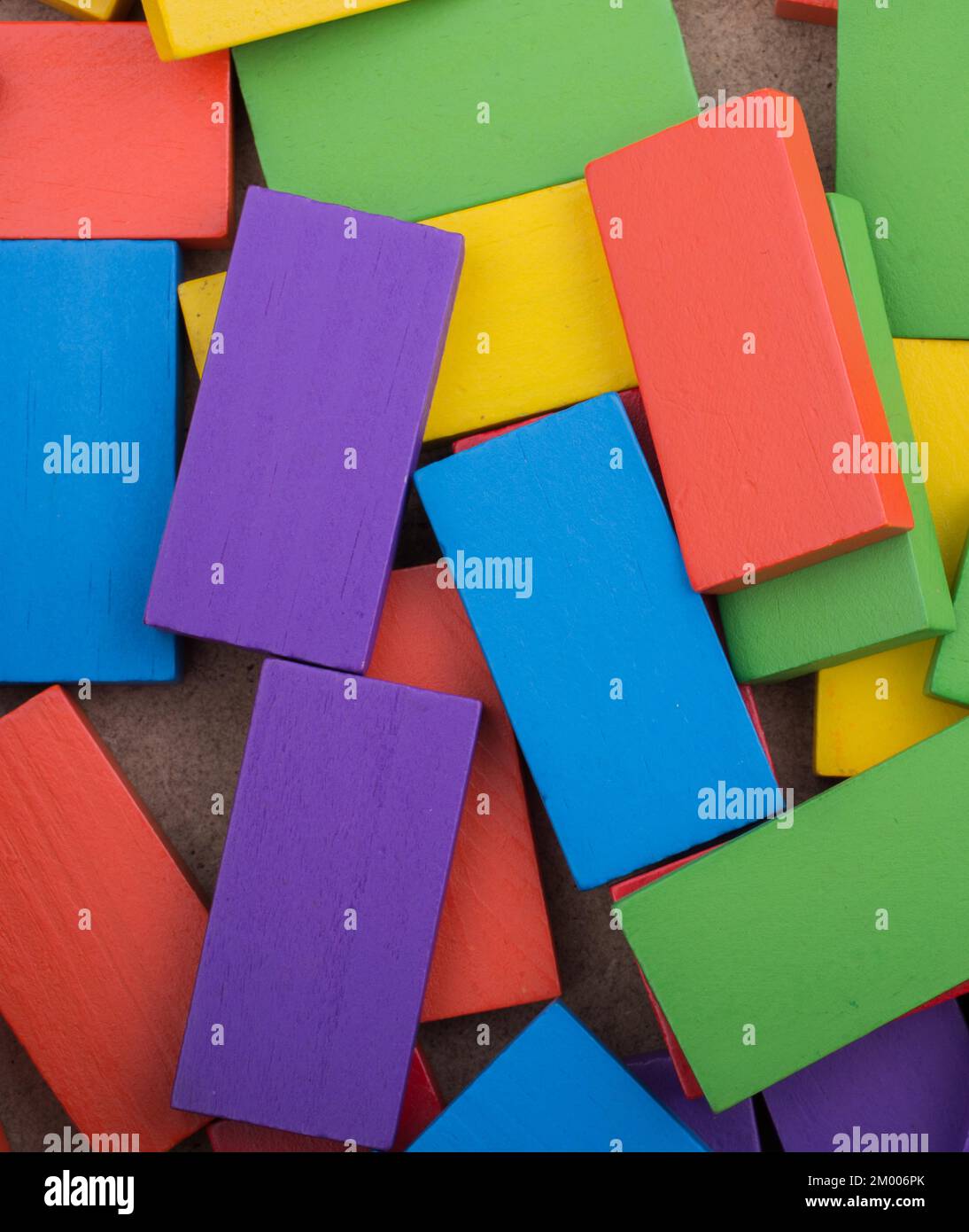 Wooden blocks of various color randomly scattered Stock Photo - Alamy