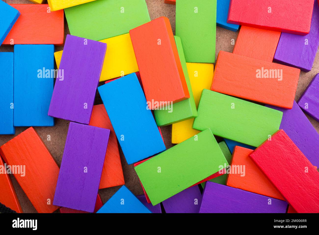 Wooden blocks of various color randomly scattered Stock Photo - Alamy