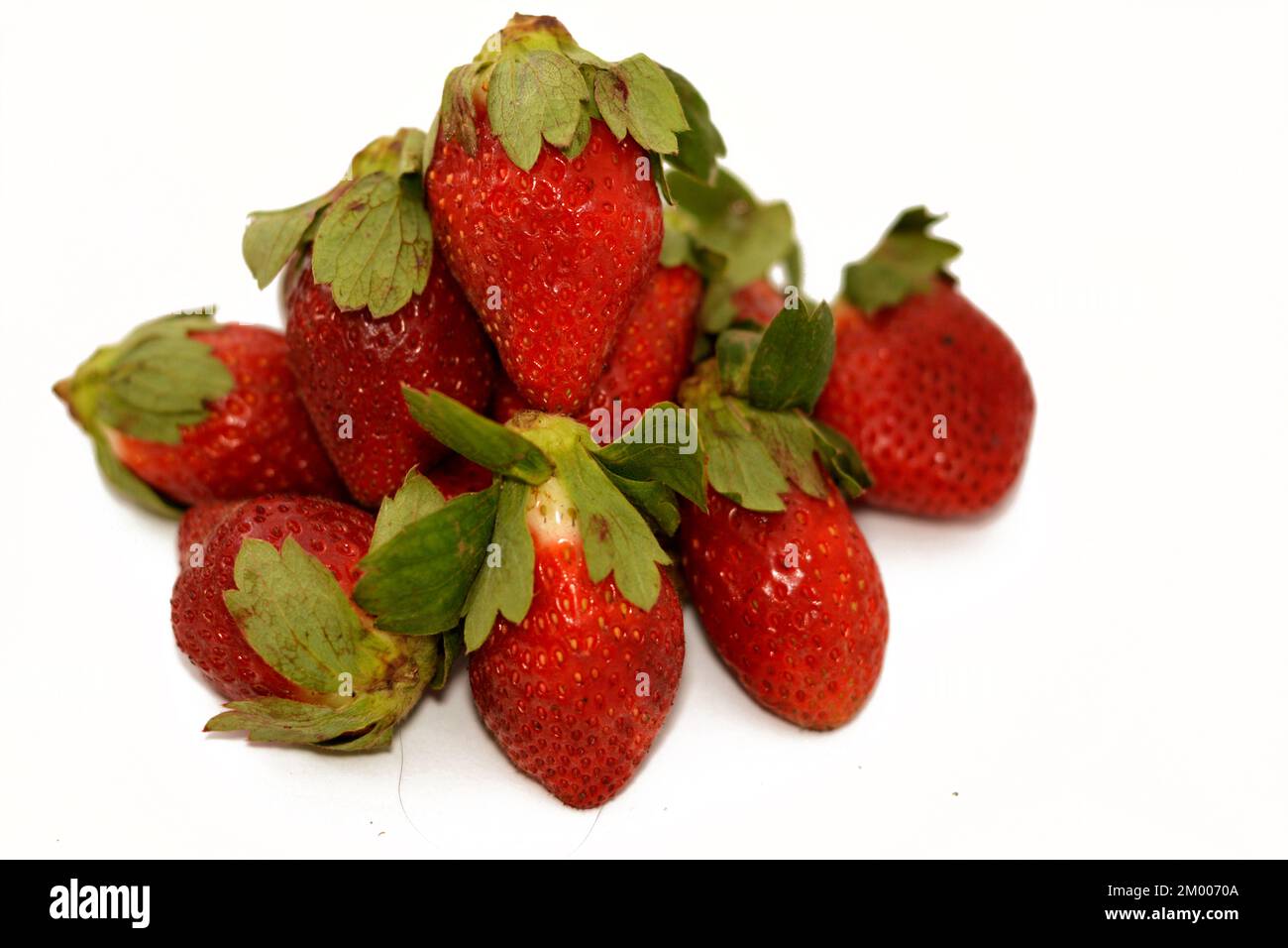 Pile of fresh strawberries fruit, the garden strawberry is a widely ...
