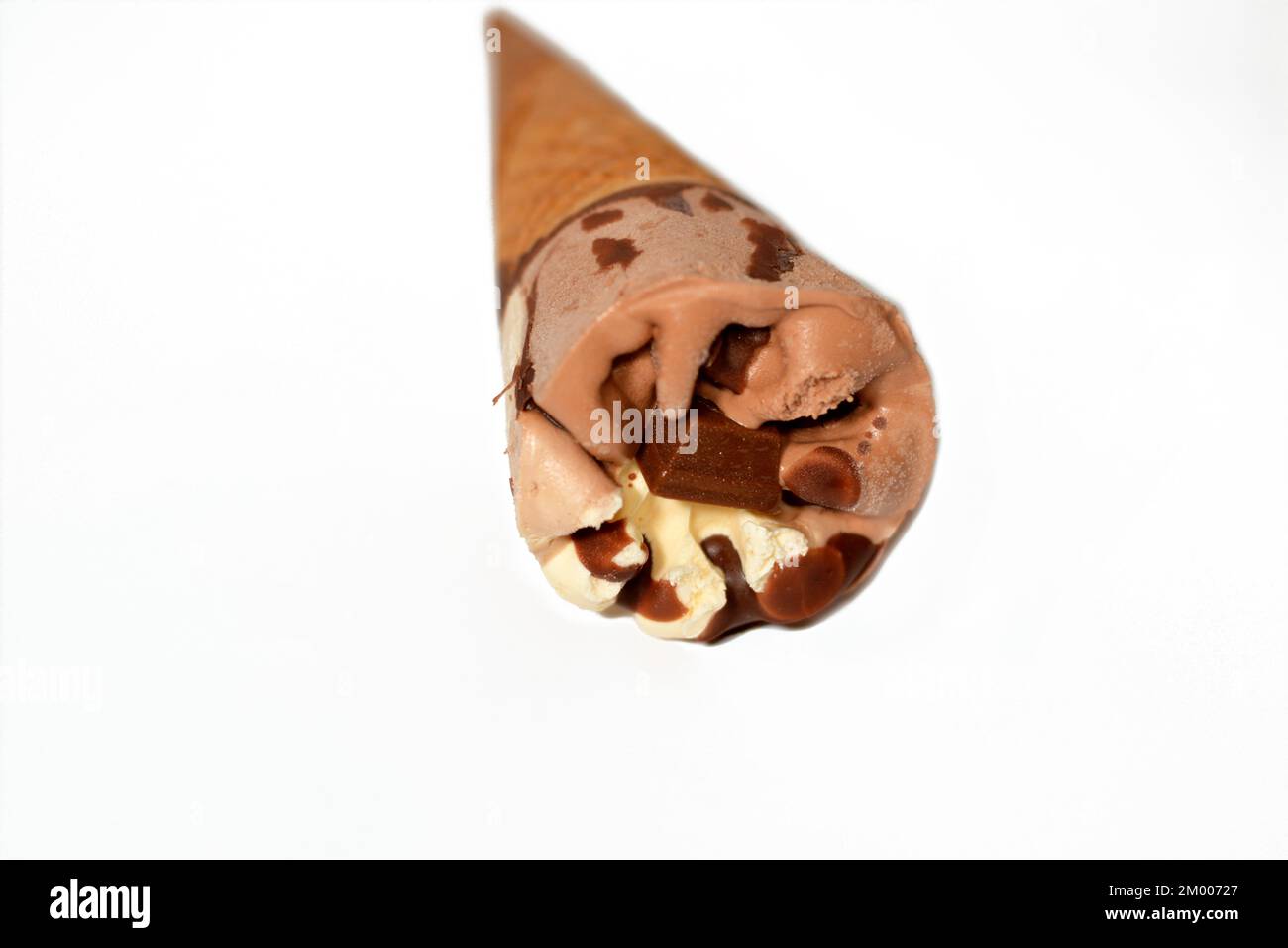 Ice cream of cocoa chocolate and vanilla cone with a chocolate bar ...