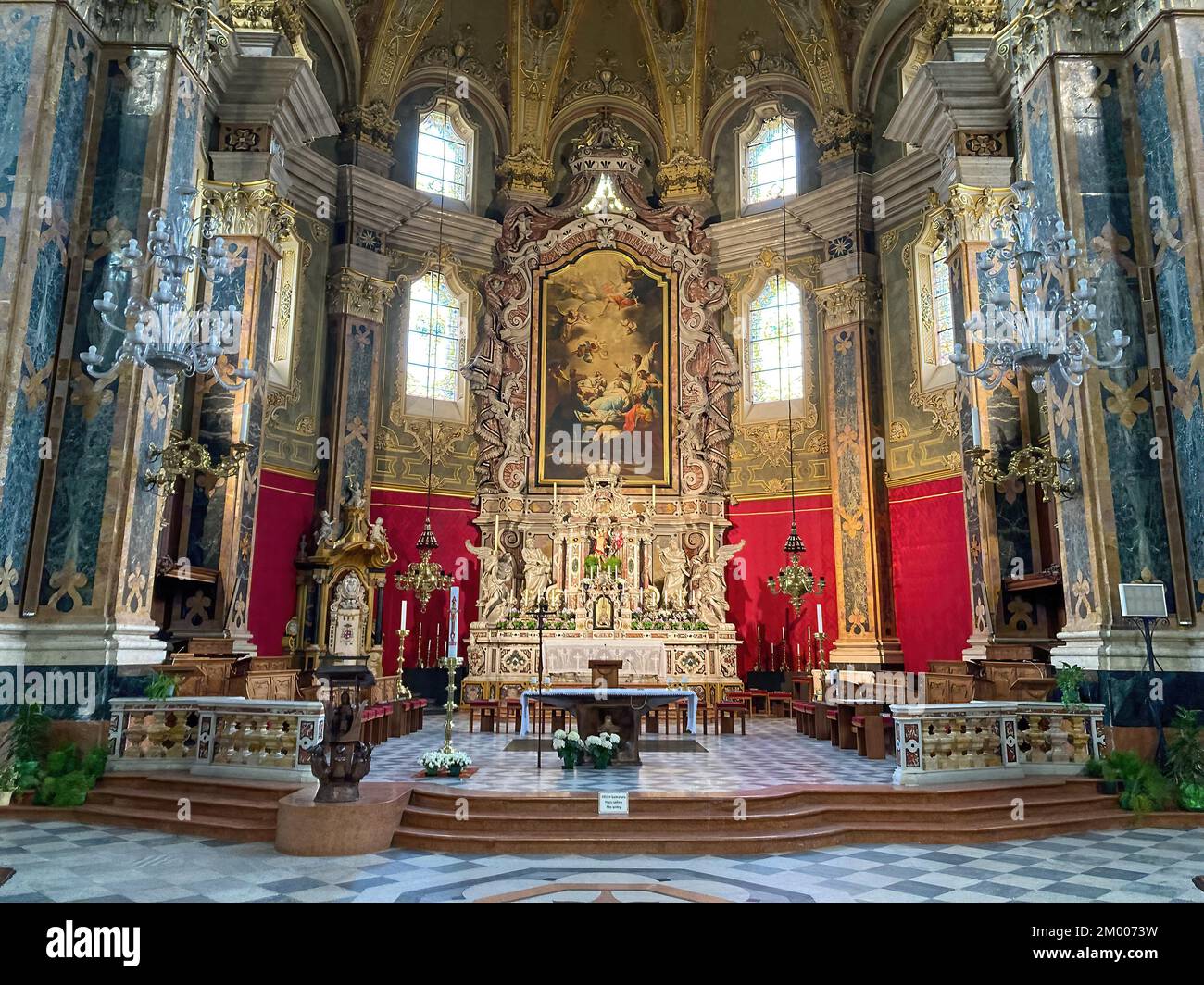 View from interior central nave nave to apse with altar of Bressanone ...