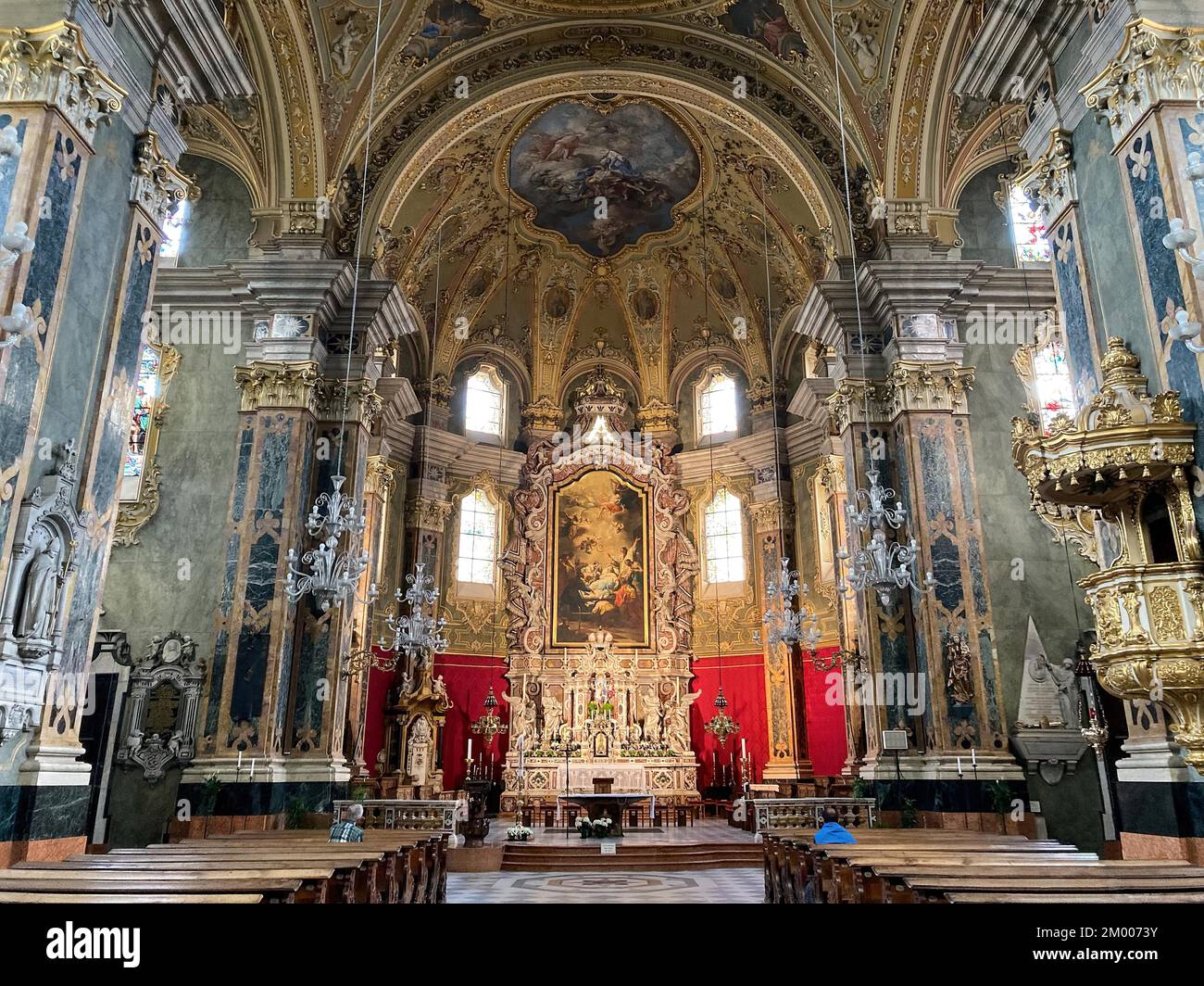 View from interior central nave nave to apse with altar of Bressanone ...