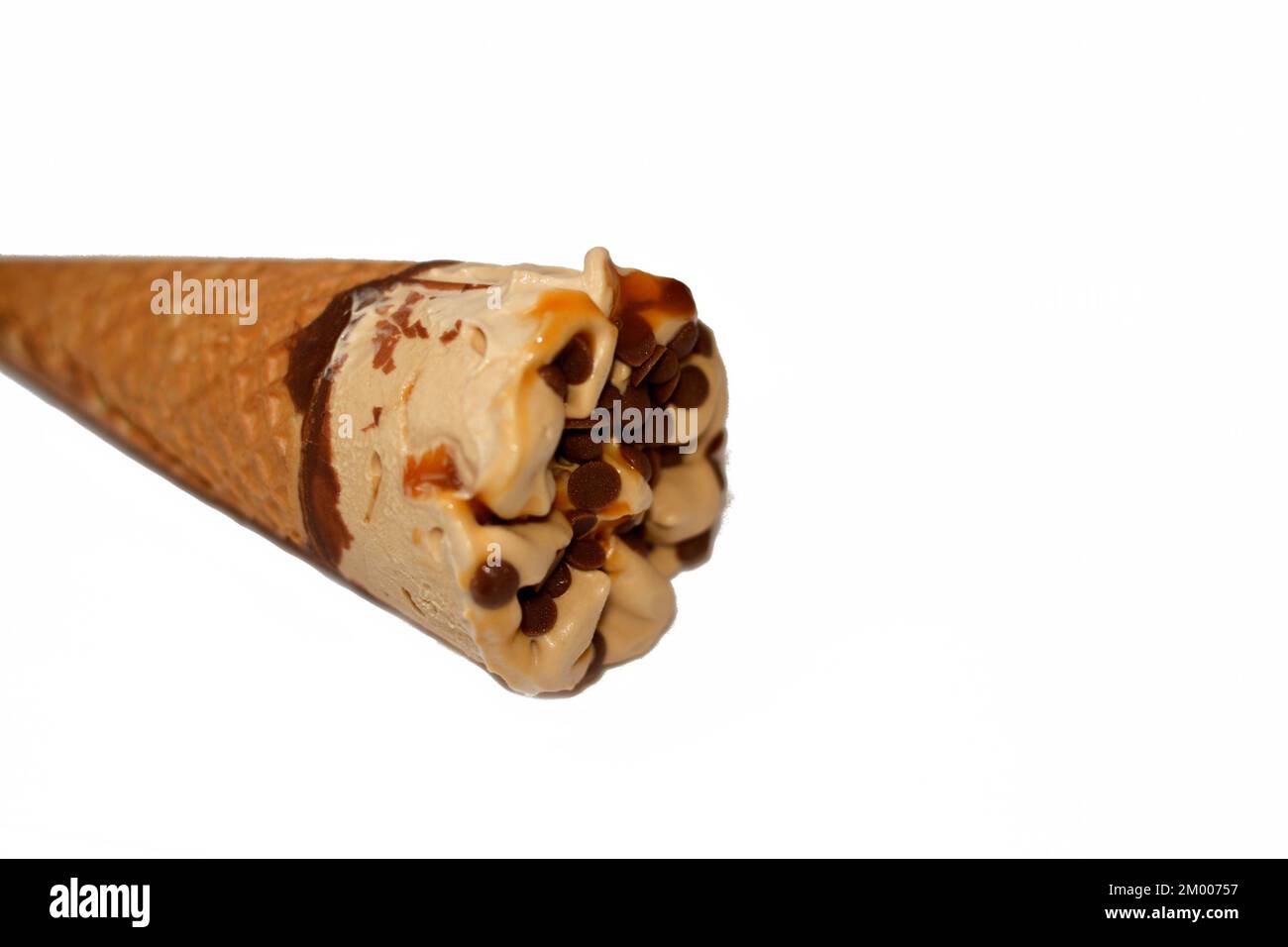 Ice cream of cocoa chocolate and vanilla cone with topping of chocolate ...