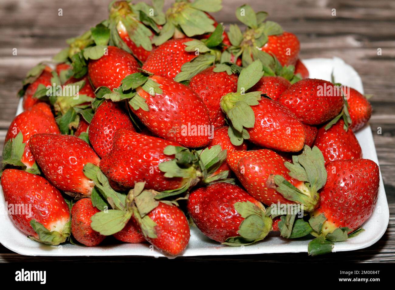 Pile of fresh strawberries fruit, the garden strawberry is a widely ...