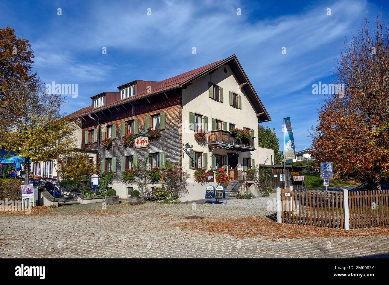 Wooden shingle barrel with floral decoration, Alpsee Inn in the ...