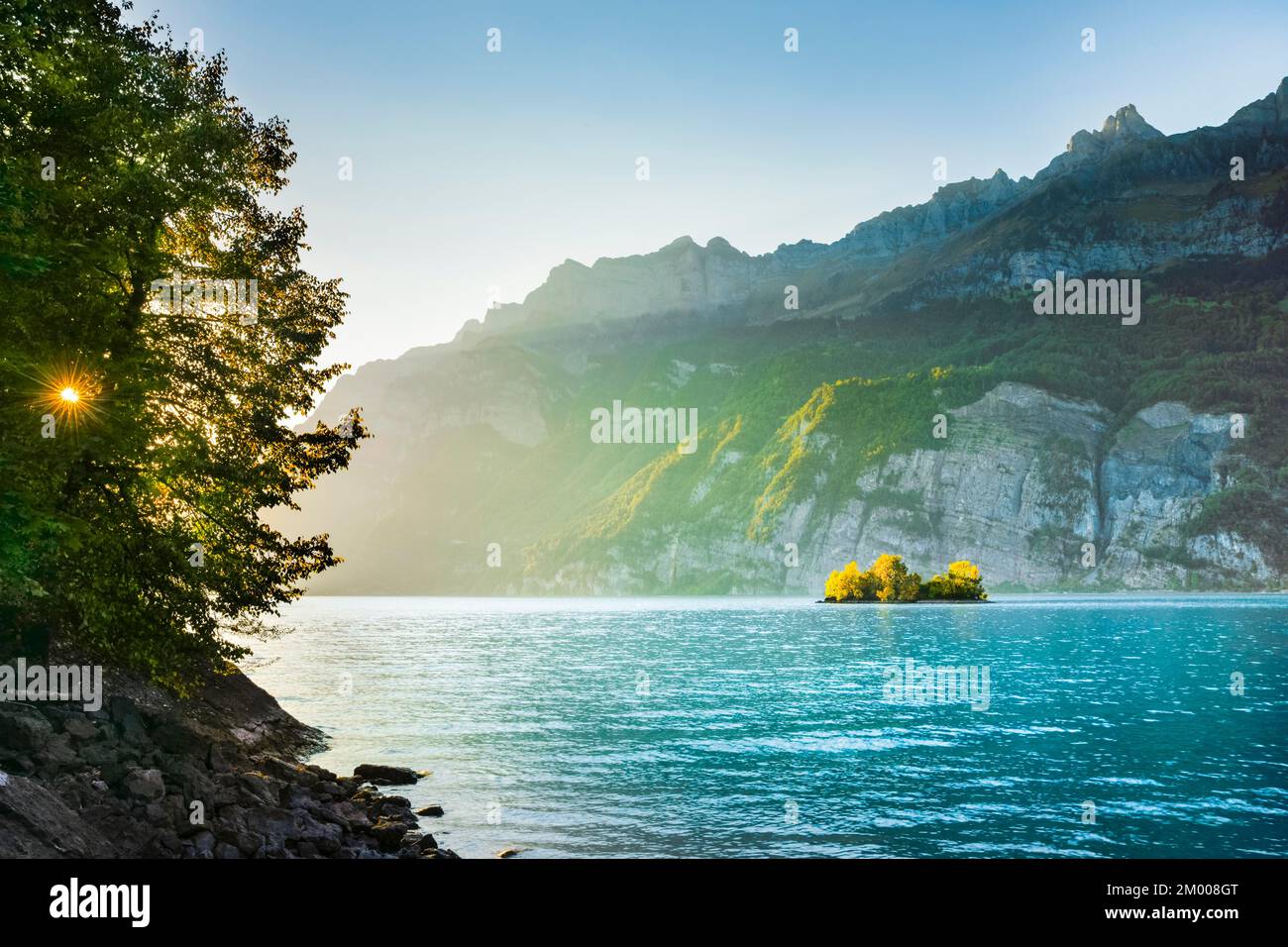 Last light over Lake Walen with the small chive island in the turquoise ...