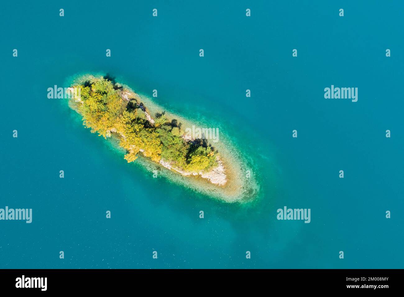 Bird's eye view of the chive island in the turquoise waters of Lake ...