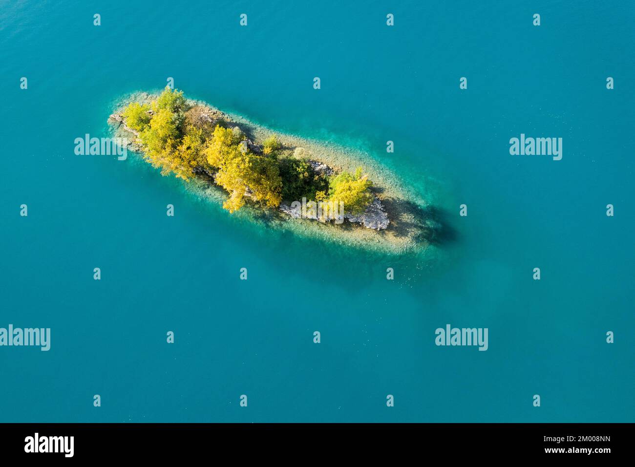 Bird's eye view of the chive island in the turquoise waters of Lake ...