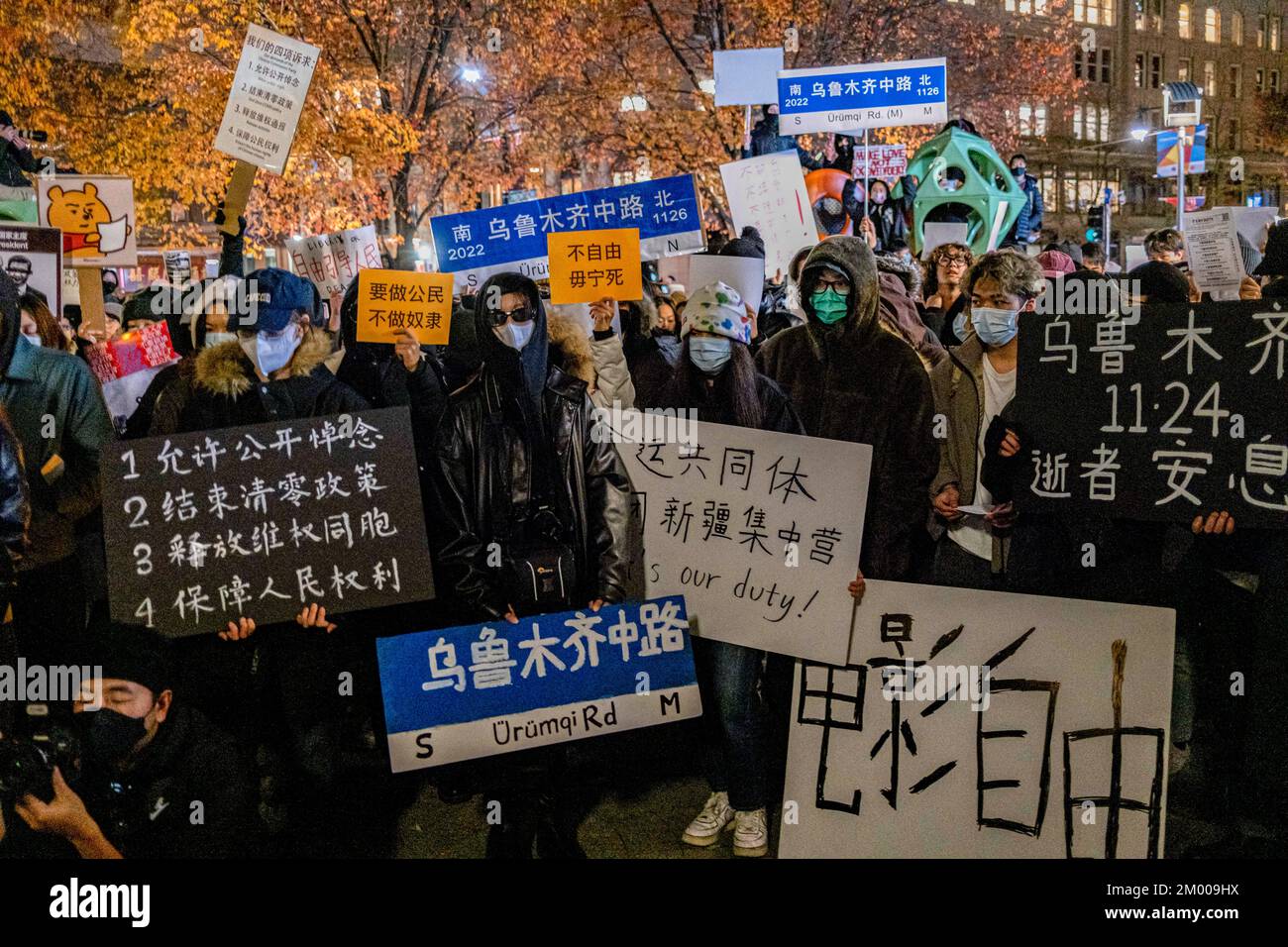Boston, United States. 02nd Dec, 2022. Demonstrators hold blank papers ...