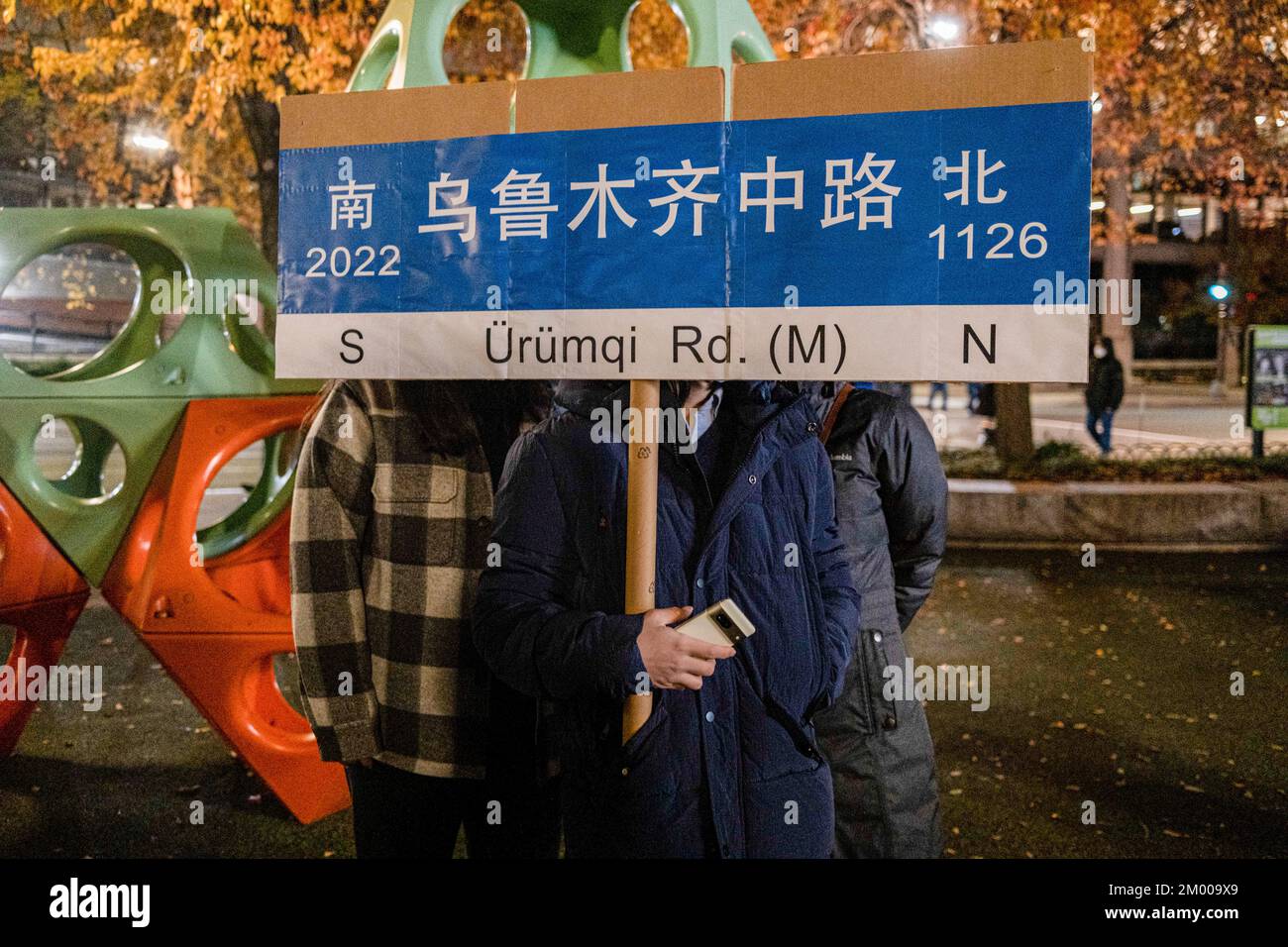 Boston, United States. 02nd Dec, 2022. A demonstrator holds a placard ...