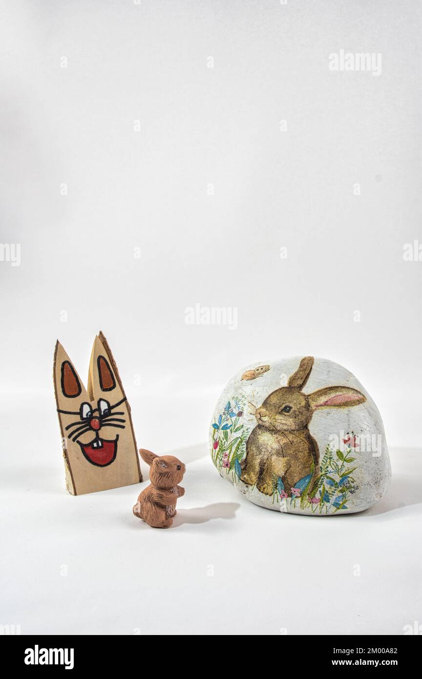 three rabbits talking Stock Photo - Alamy