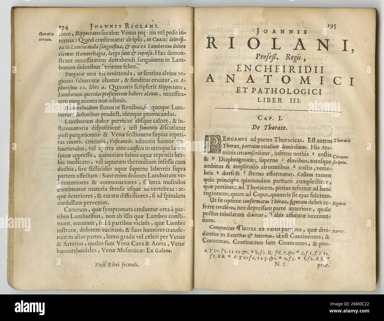 Worn old book pages of a Latin textbook. An old book with its pages on ...
