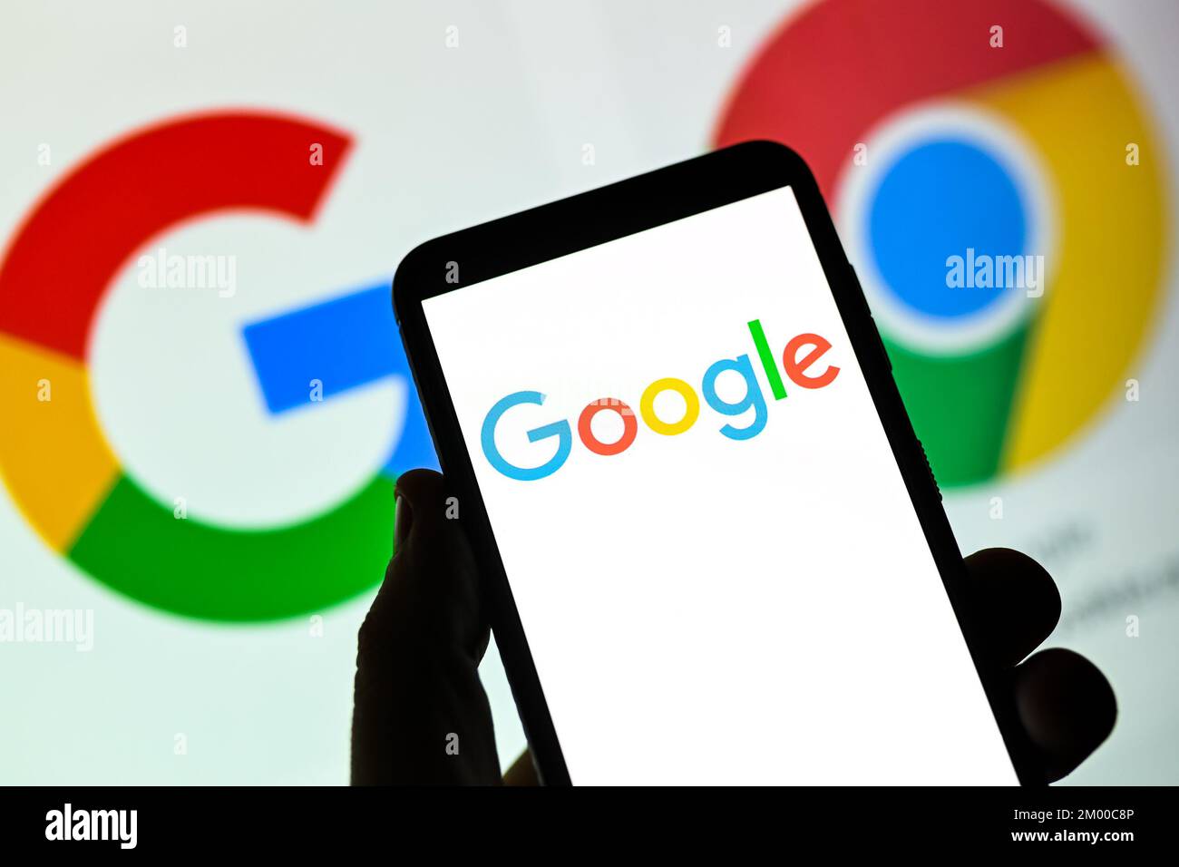 In this photo illustration a Google logo seen displayed on a smartphone. (Photo by Mateusz ...