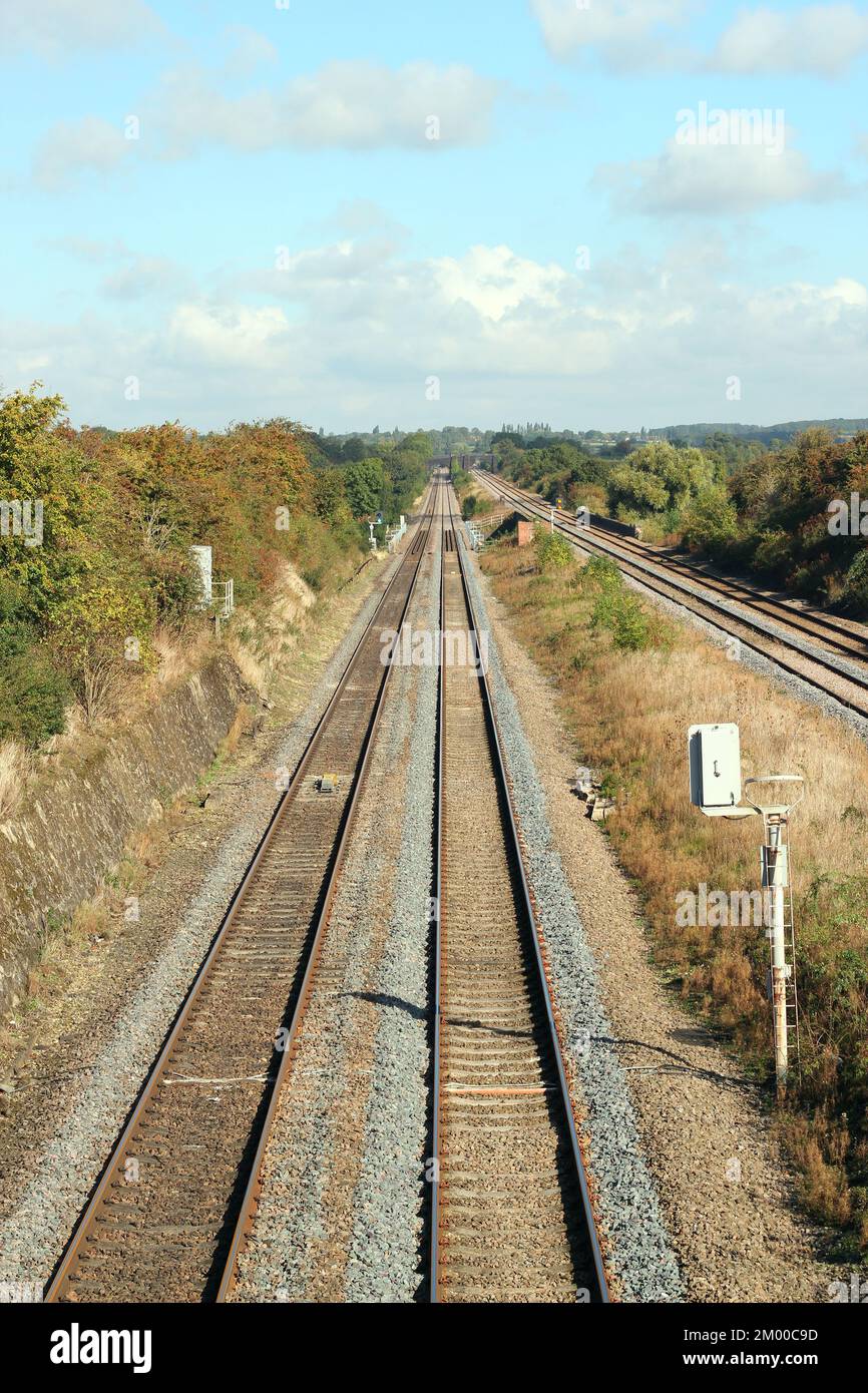Straight railway lines leading off into the distance Stock Photo - Alamy