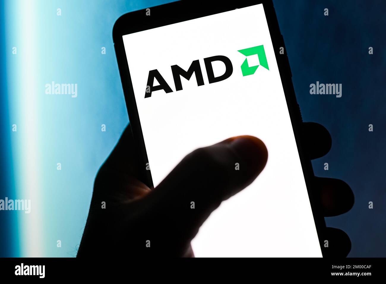 In this photo illustration an AMD logo seen displayed on a smartphone ...