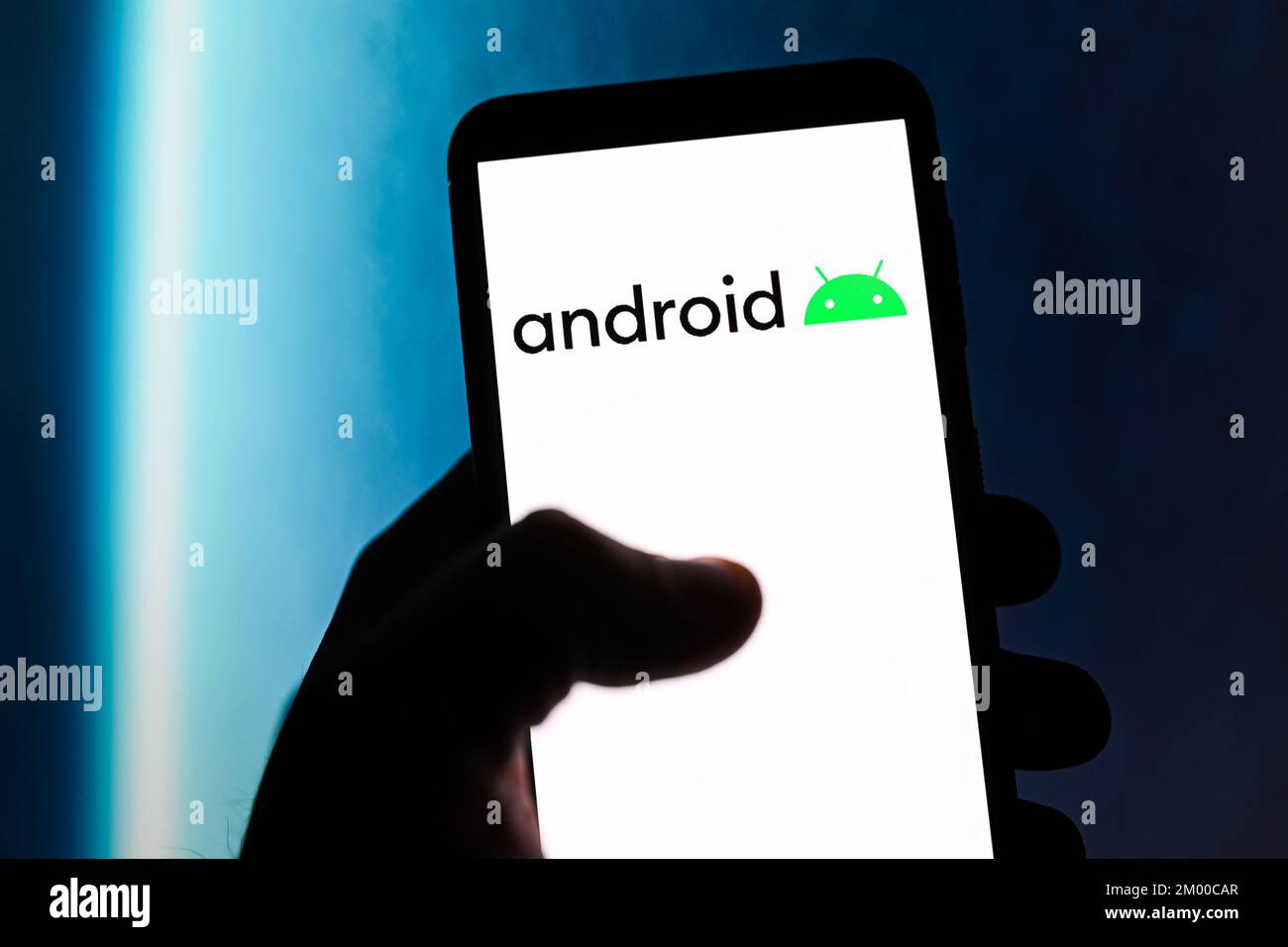 In this photo illustration an Android logo seen displayed on a smartphone. (Photo by Mateusz ...