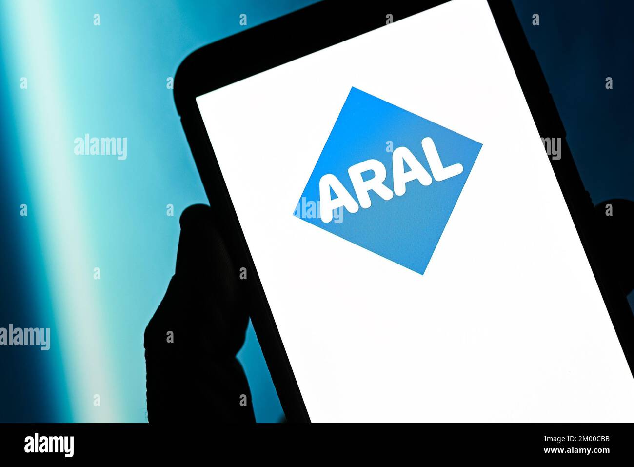 In this photo illustration an Aral logo seen displayed on a smartphone ...
