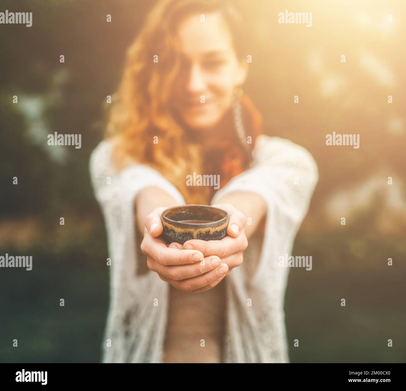 Cacao ceremony, heart opening medicine. Ceremony space. Cacao cup in ...