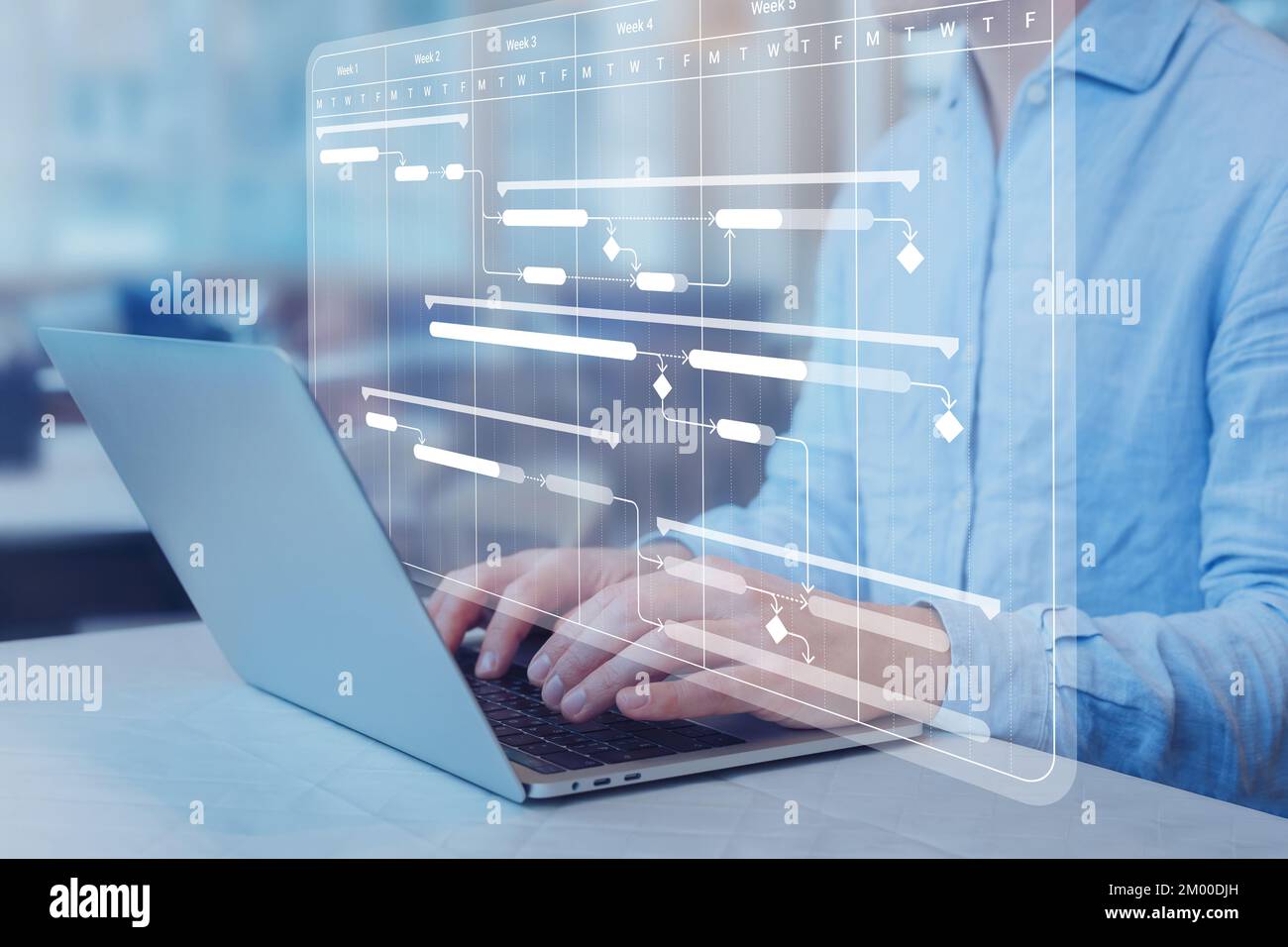 Project manager working with Gantt chart schedule to plan tasks and ... Project manager working with Gantt chart schedule to plan tasks and ...