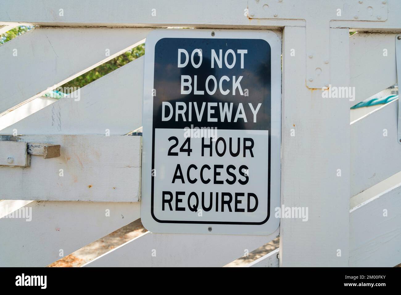 Destin, Florida- Close-up of a sign with Do Not Block Driveway 24 Hour ...