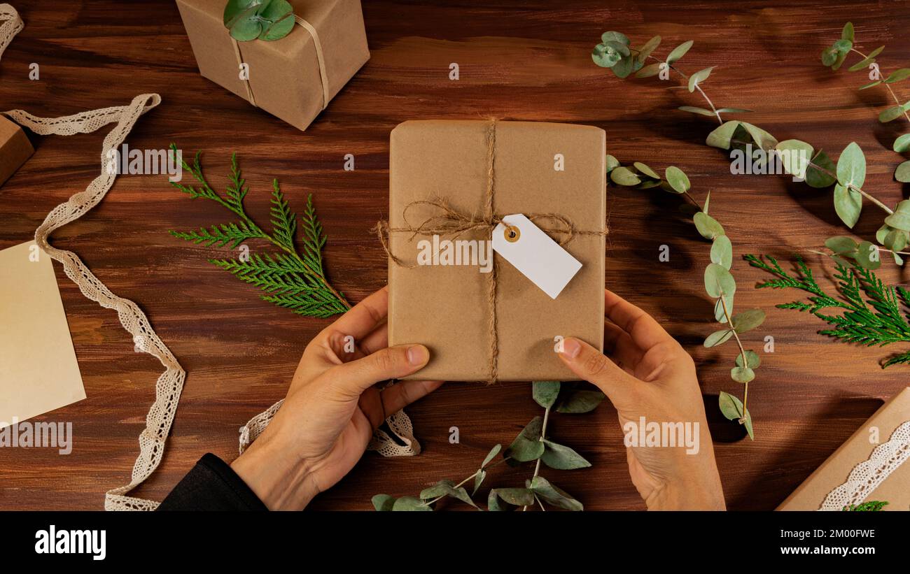 Man holding small cardboard box hi-res stock photography and images - Alamy