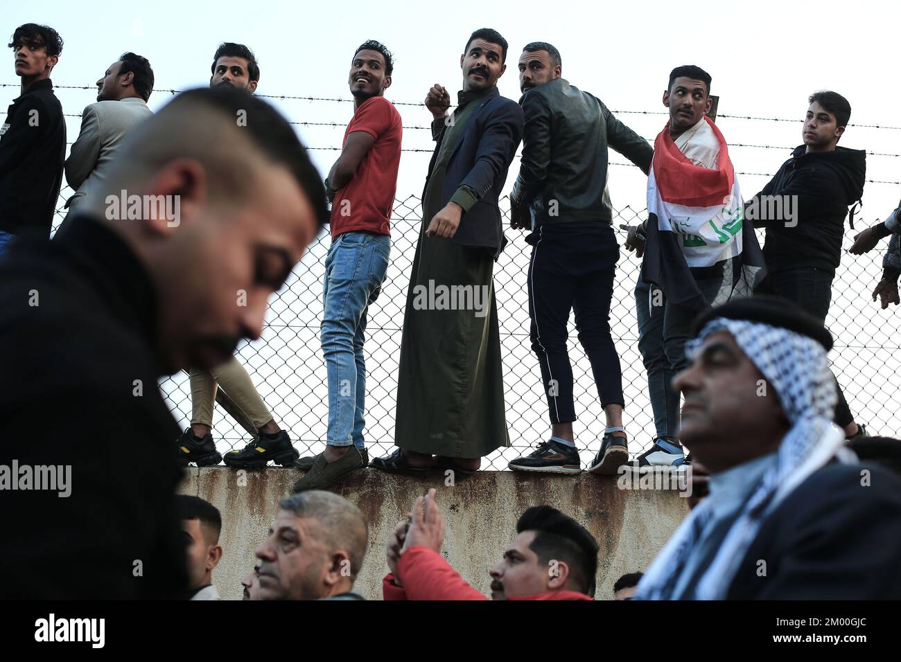 Baghdad, Iraq. 03rd Dec, 2022. People watch military cadets of the ...