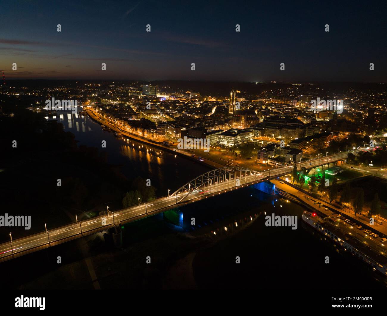Arnhem city in the Netherlands by night Aerial drone. City center ...